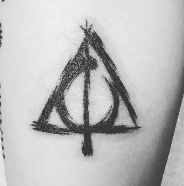Hario Poterio įkvėptos tatuiruotės