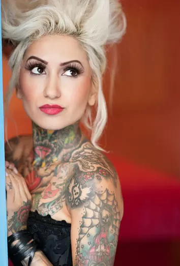 Wat beteken dit om oor tatoeëermerke te droom?