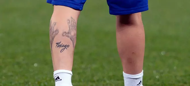 Messi's tattoo on the left calf.