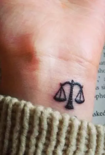 Justiça e outros significados das tatuagens de escamas