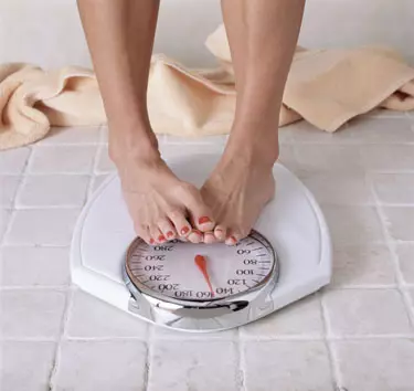 Saikne starp ķermeņa masas indeksu un diabētu sievietēm